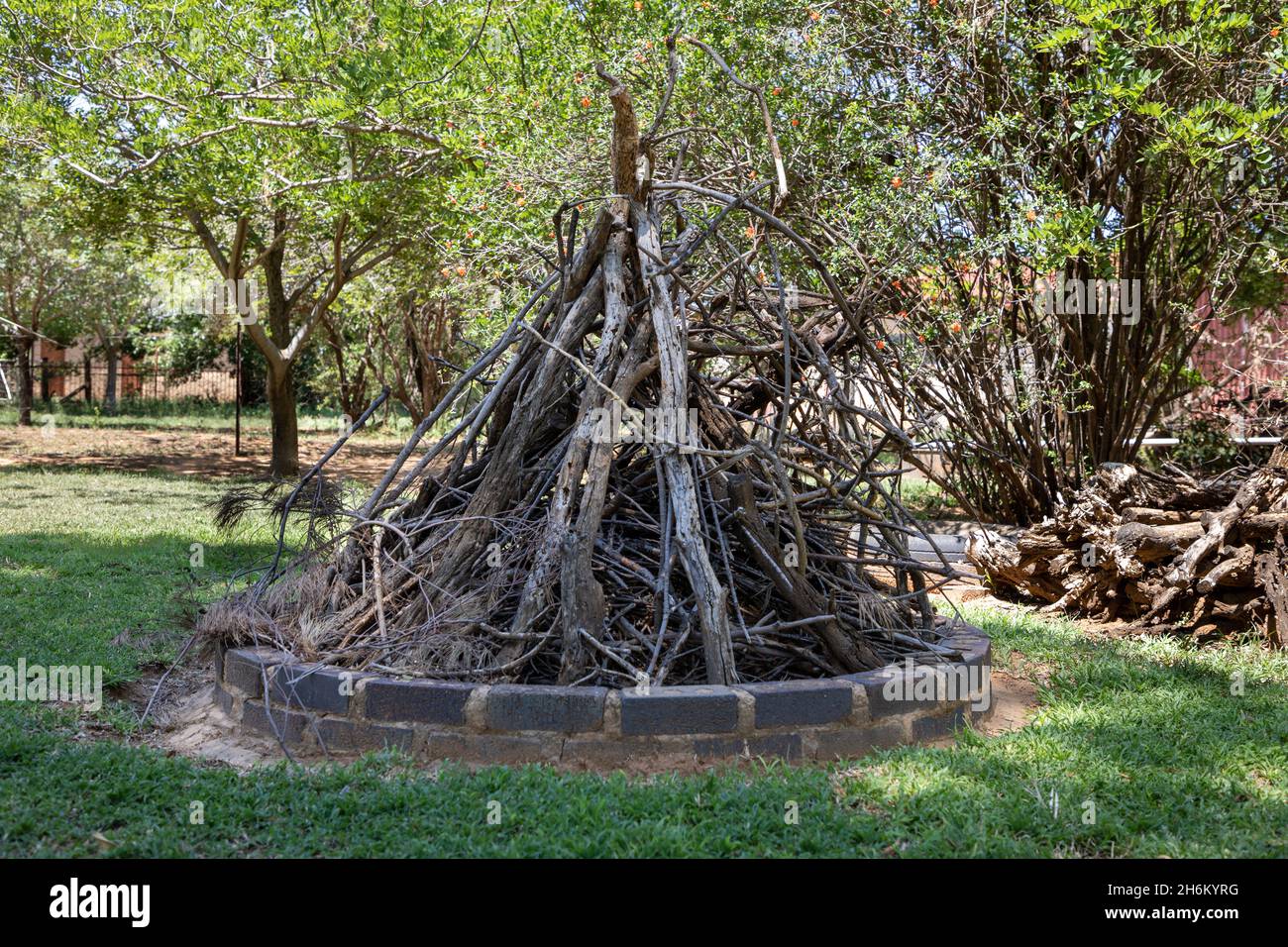 Large pile of wood that is stacked to be lit as a bonfire Stock Photo ...