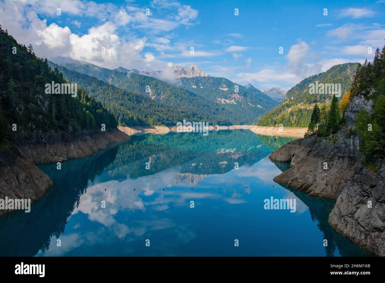 Low water in Sauris Lake, Lago di Sauris, late September. The lake is ...