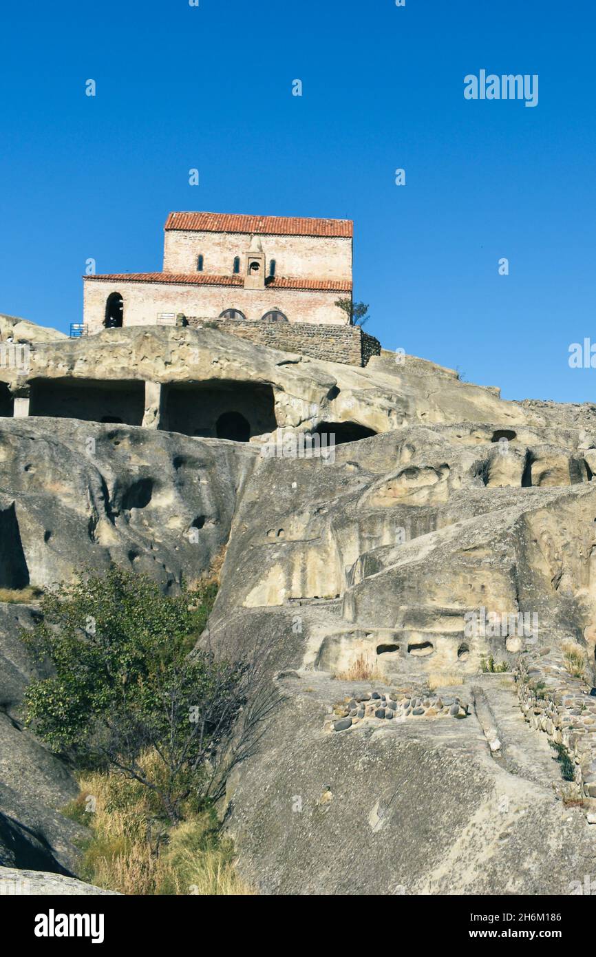 The Uplistsikhe cave complex near Gori, Georgia. Three-nave basilica on ...