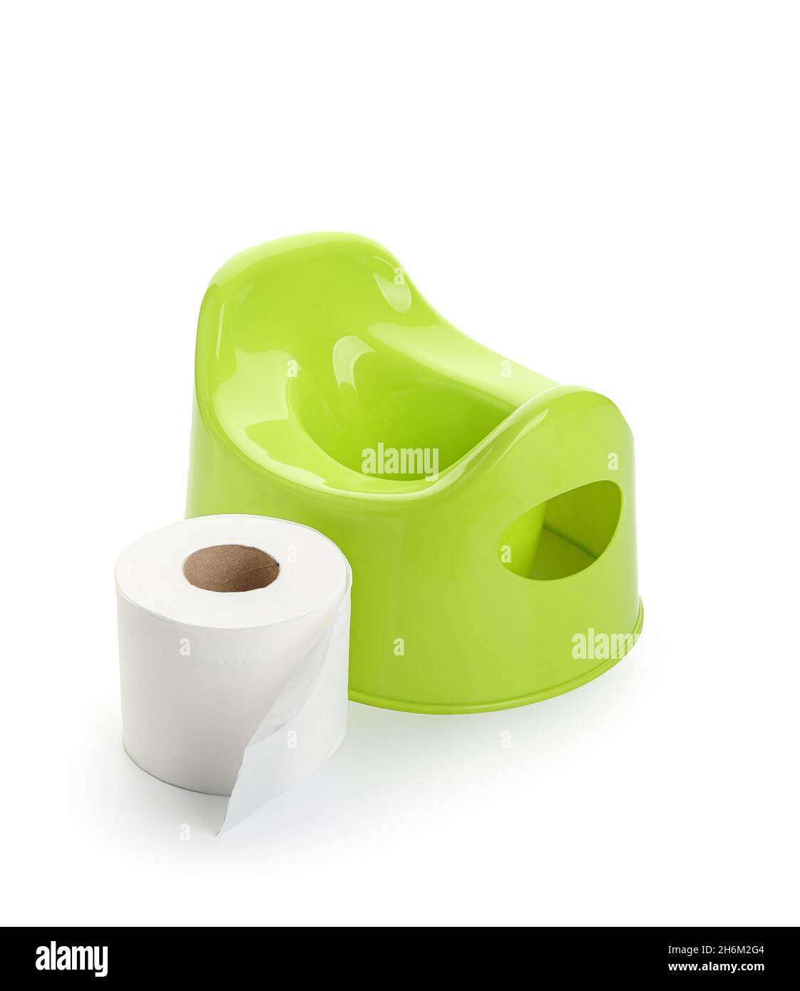 Toilet paper roll and potty on white background Stock Photo - Alamy