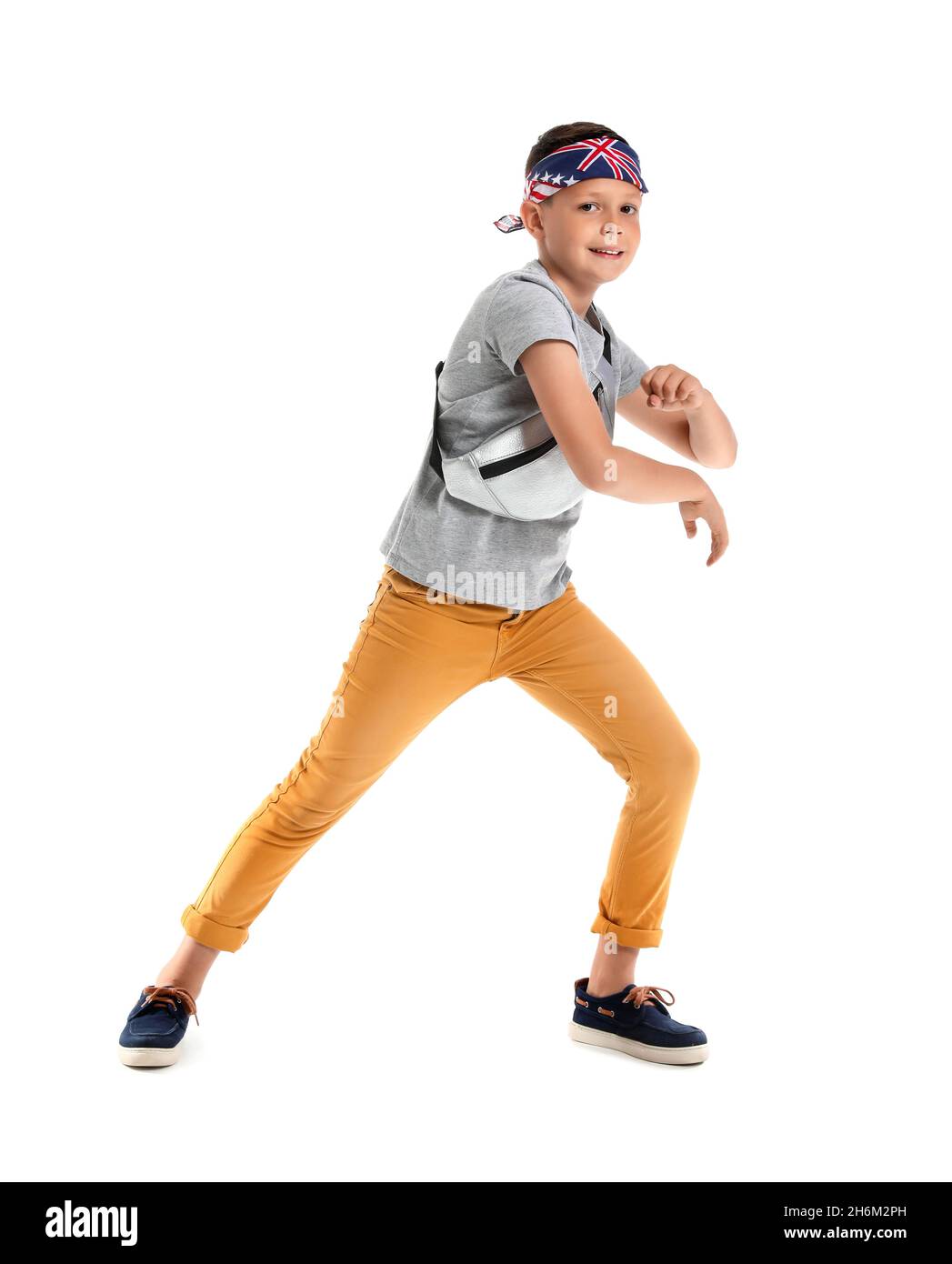 Dancing little boy isolated on white Stock Photo - Alamy