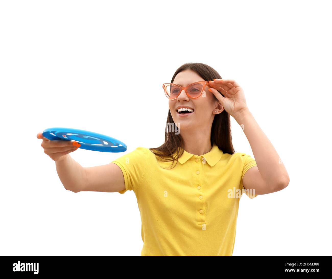 Beautiful young woman playing frisbee on white background Stock Photo ...