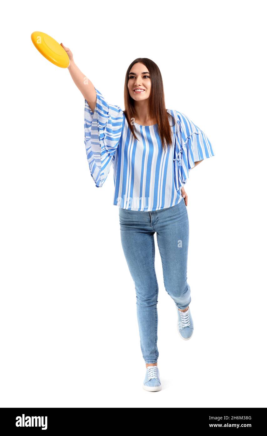 Beautiful young woman with frisbee disk on white background Stock Photo ...