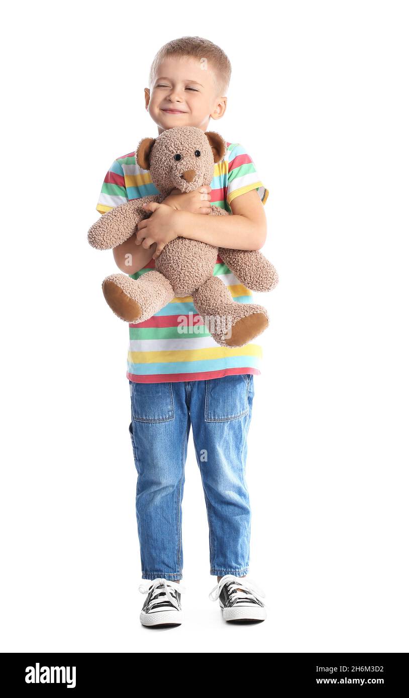 Adorable little boy with teddy bear on white background Stock Photo - Alamy