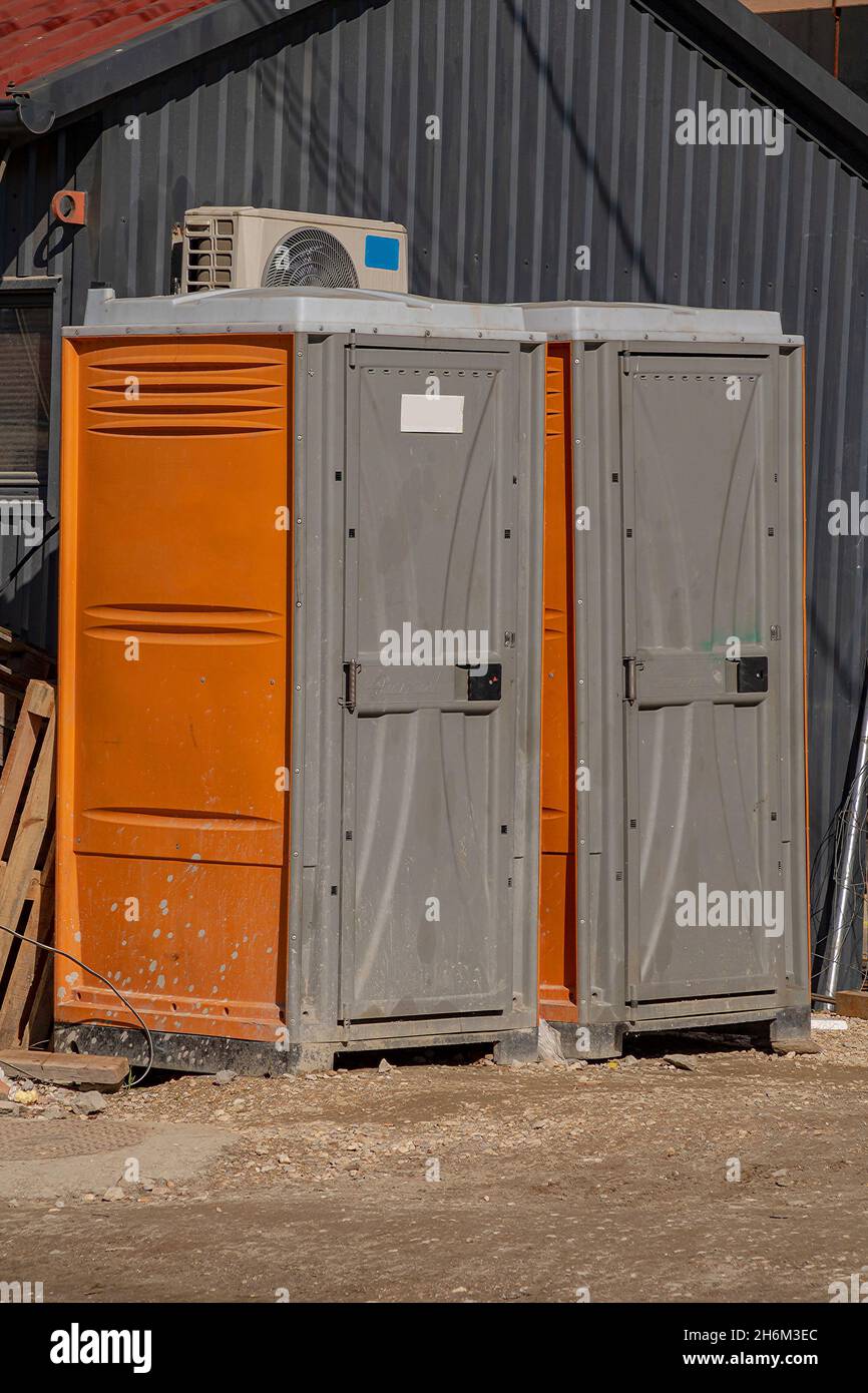 Portable mobile public restrooms outside on urban street Stock Photo ...