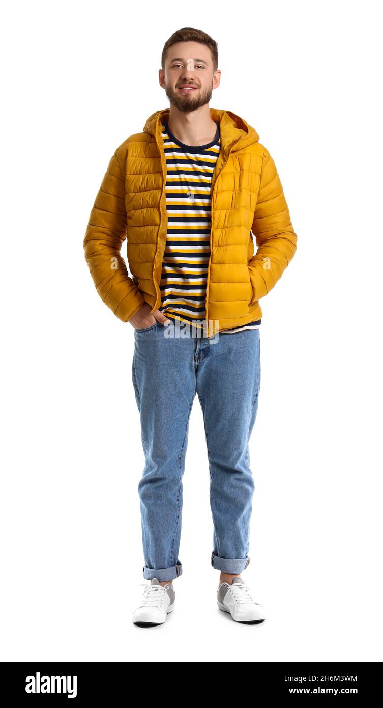Stylish young man in yellow jacket on white background Stock Photo - Alamy
