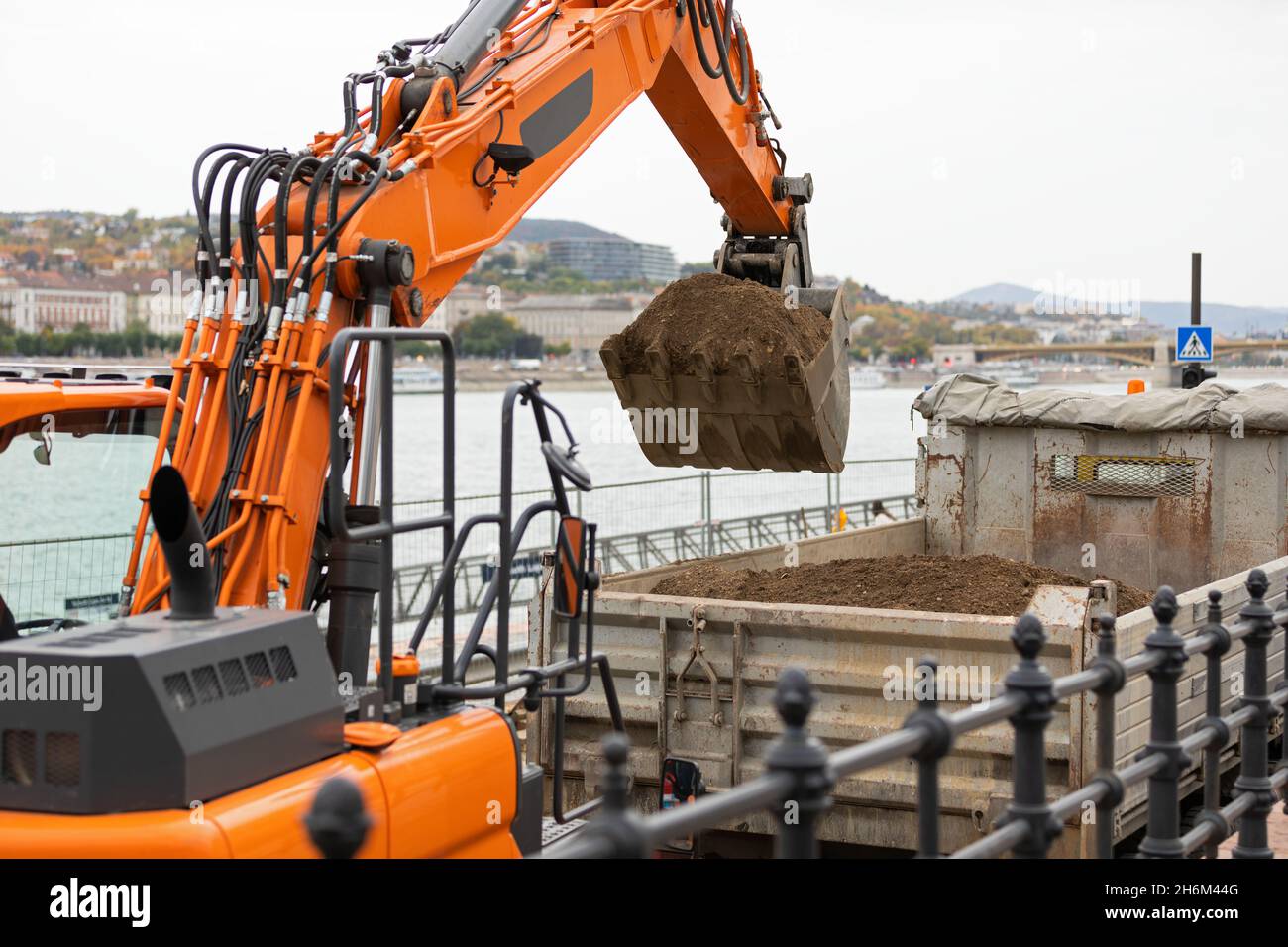 Picture of an excavators machine in construction site Stock Photo - Alamy