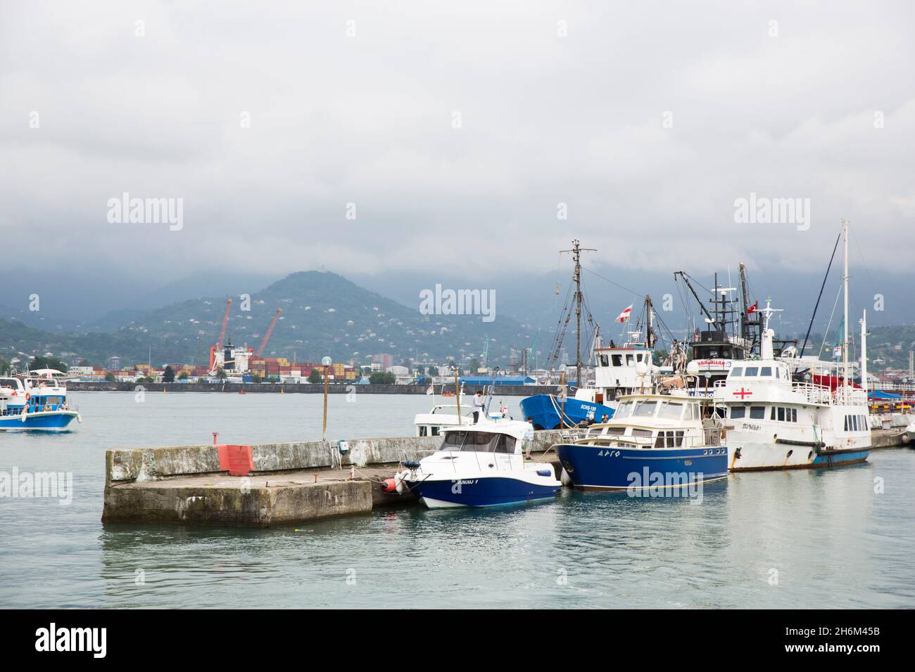 BATUMI, GEORGIA- JINE 26, 2021: View of Batumi sea port. Ships, boats ...
