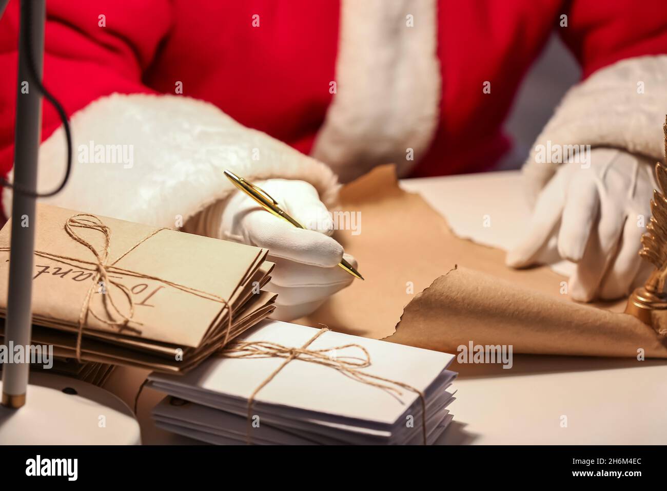 Santa Claus writing letter on Christmas eve Stock Photo - Alamy