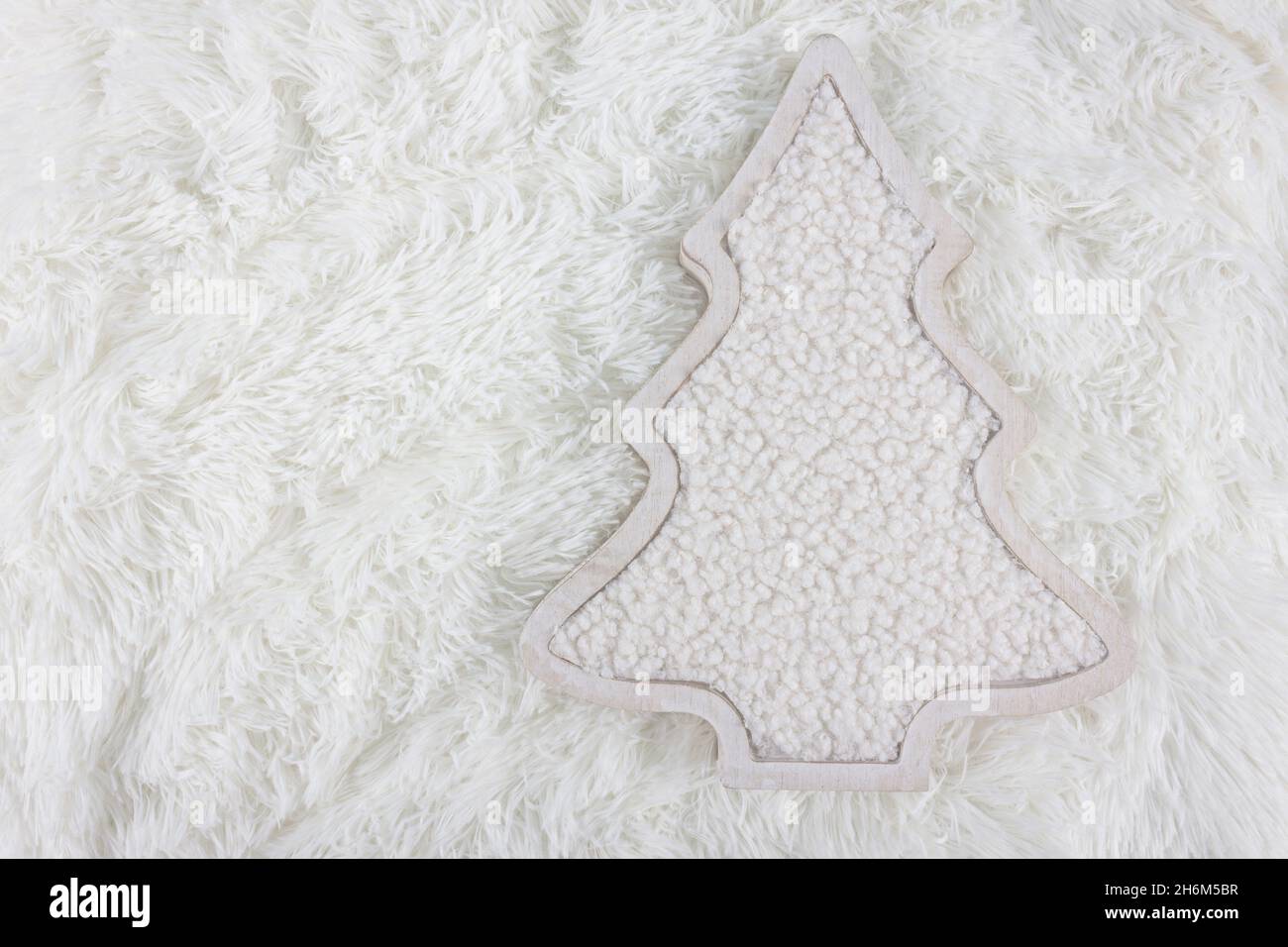 Christmas and New Year concept. The Christmas tree is made from wool on ...