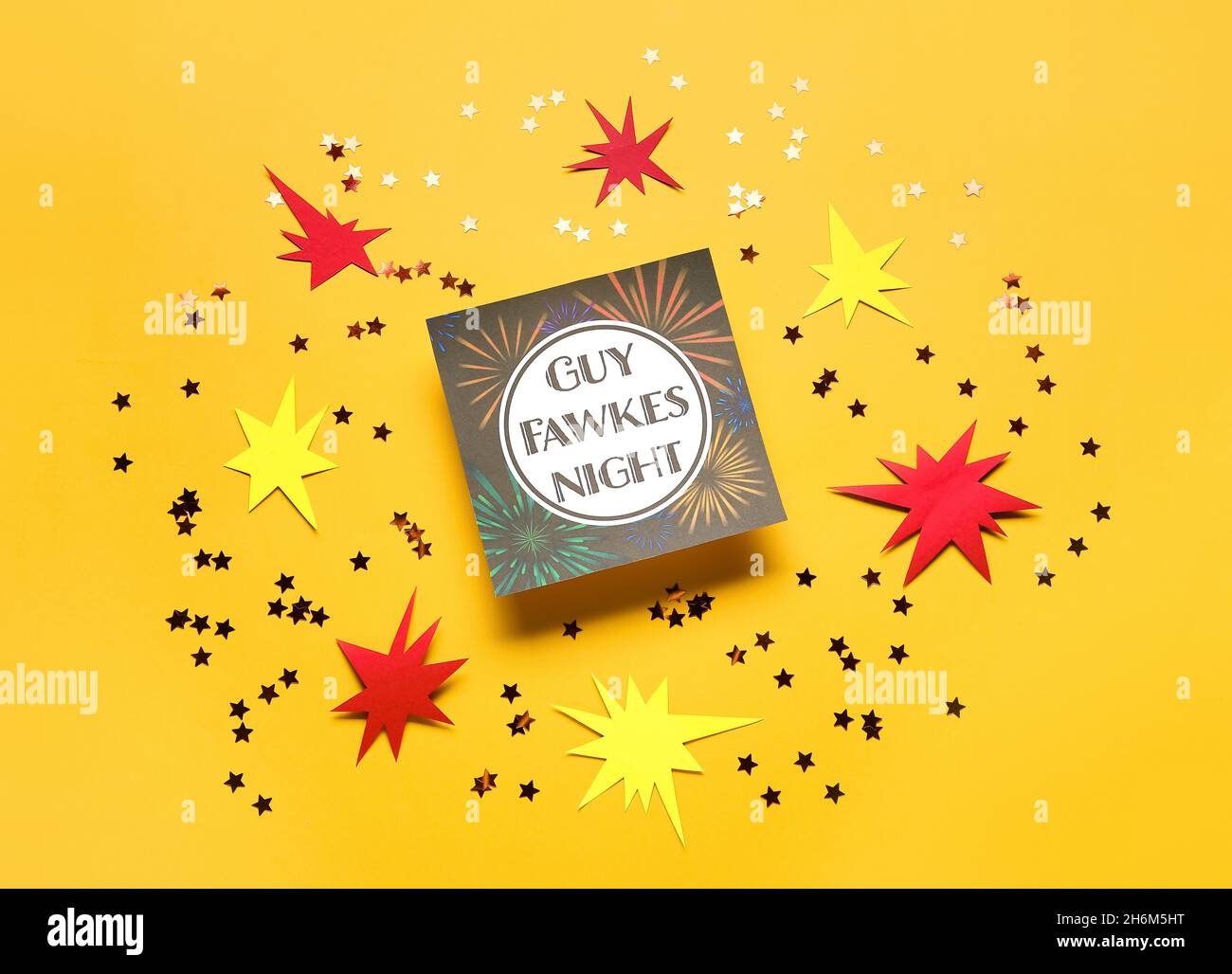 Greeting card for Guy Fawkes night and confetti on orange background ...
