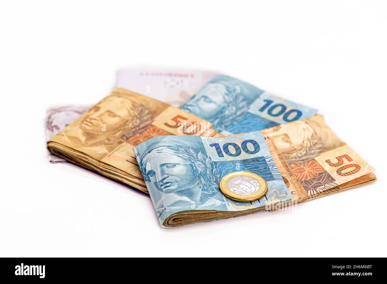 brazil money banknotes, one real coin, 100 and 50 bills, isolated white ...