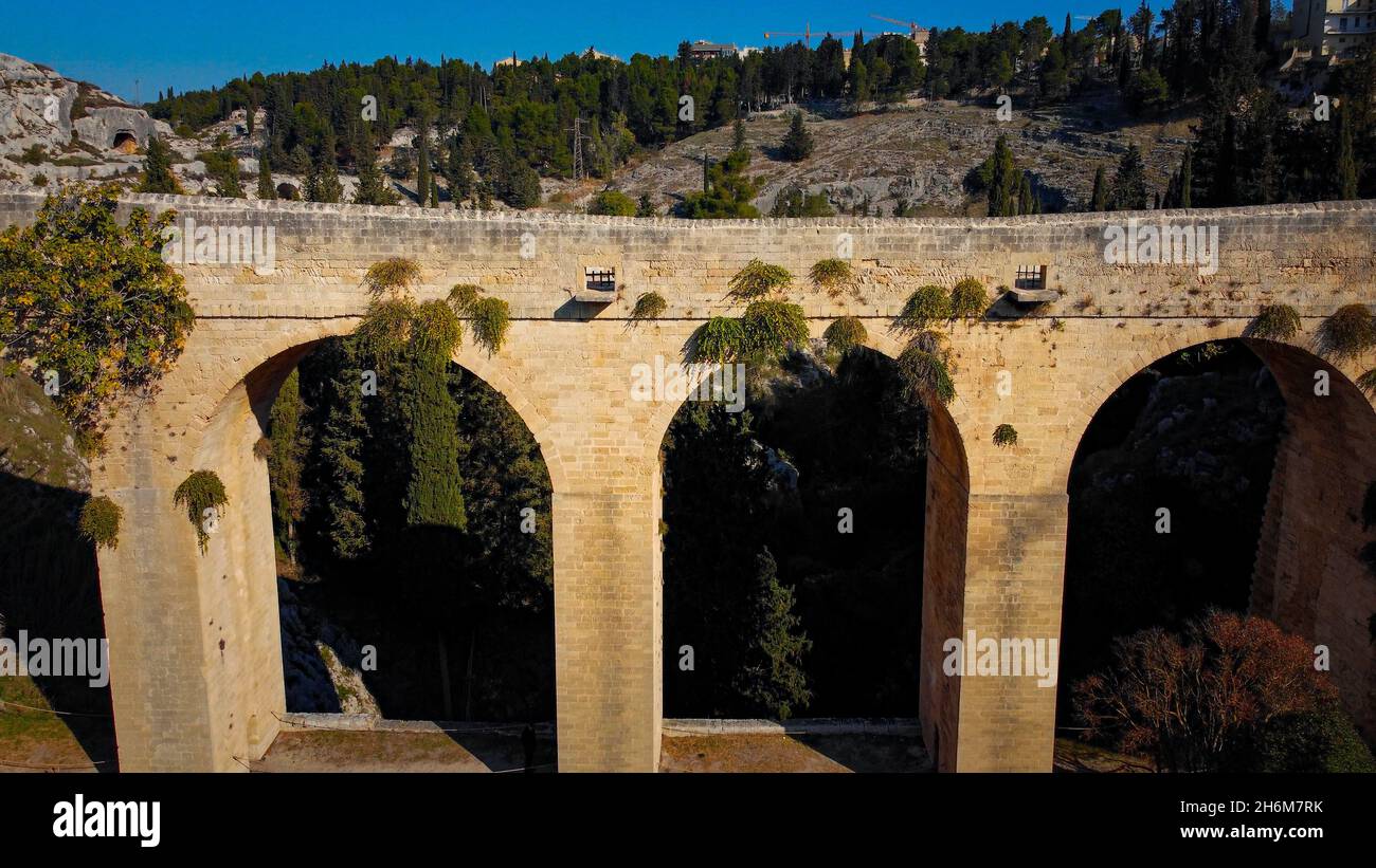 Aerial view over the bridge of Gravina in Puglia in Italy - the ancient ...