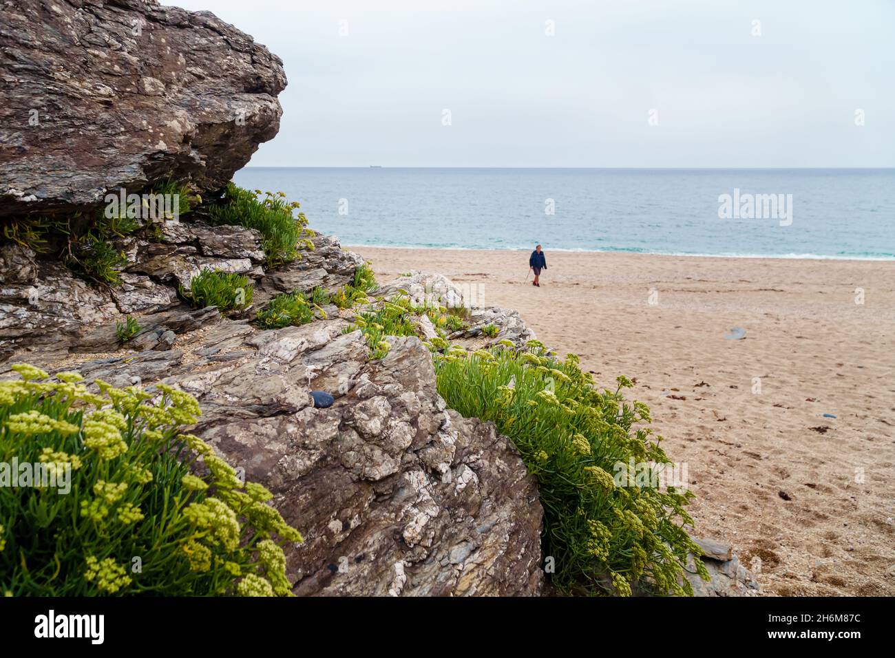 Caucasian man taking a quiet walk on the beach, Cornwall, UK Stock ...
