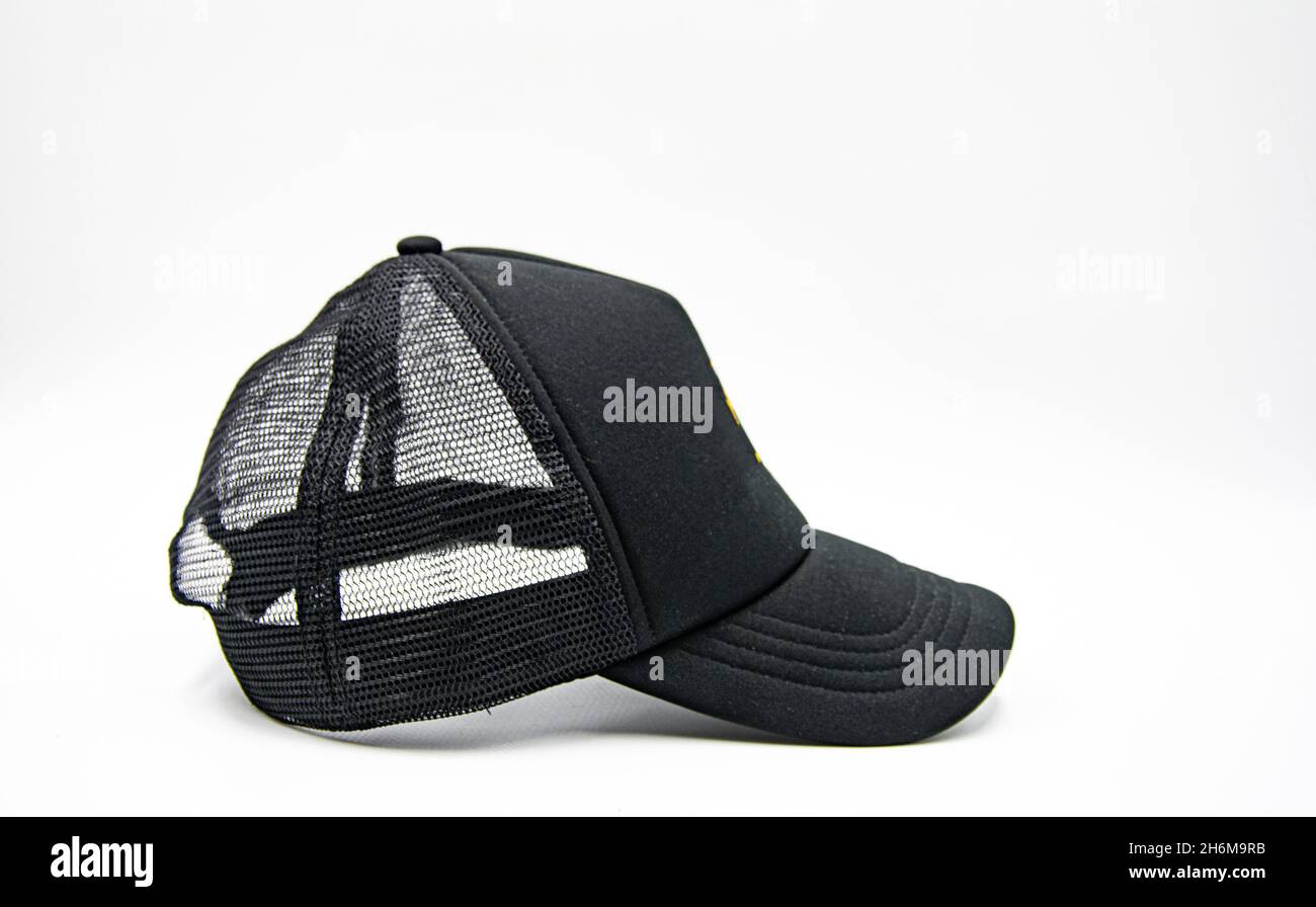Close-Up Of Black Cap Over White Background Stock Photo - Alamy