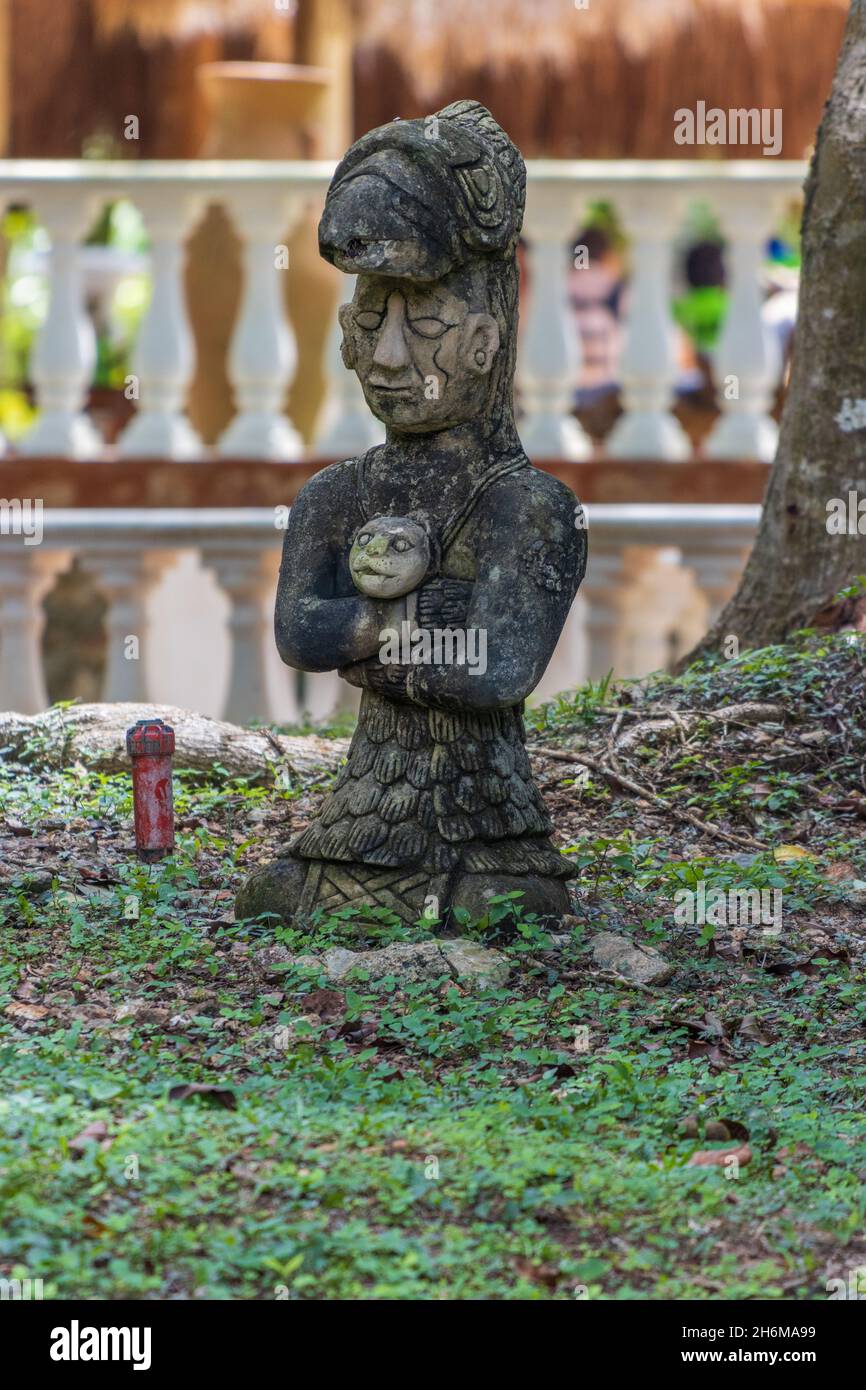 Vertical shot of an outdoor statue in a garden Stock Photo - Alamy