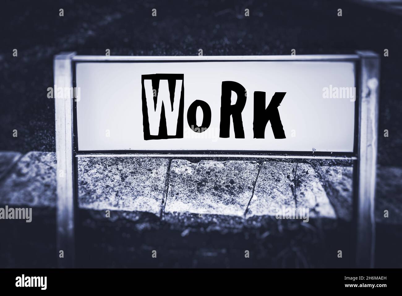 Work displayed on a street sign Stock Photo - Alamy