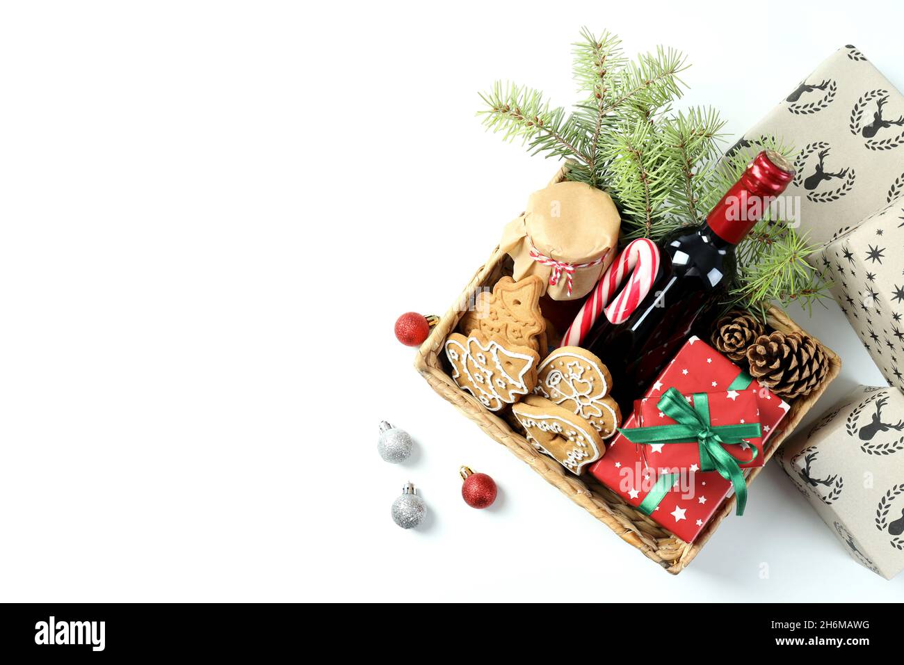 Concept of gift with Christmas basket on white background Stock Photo ...