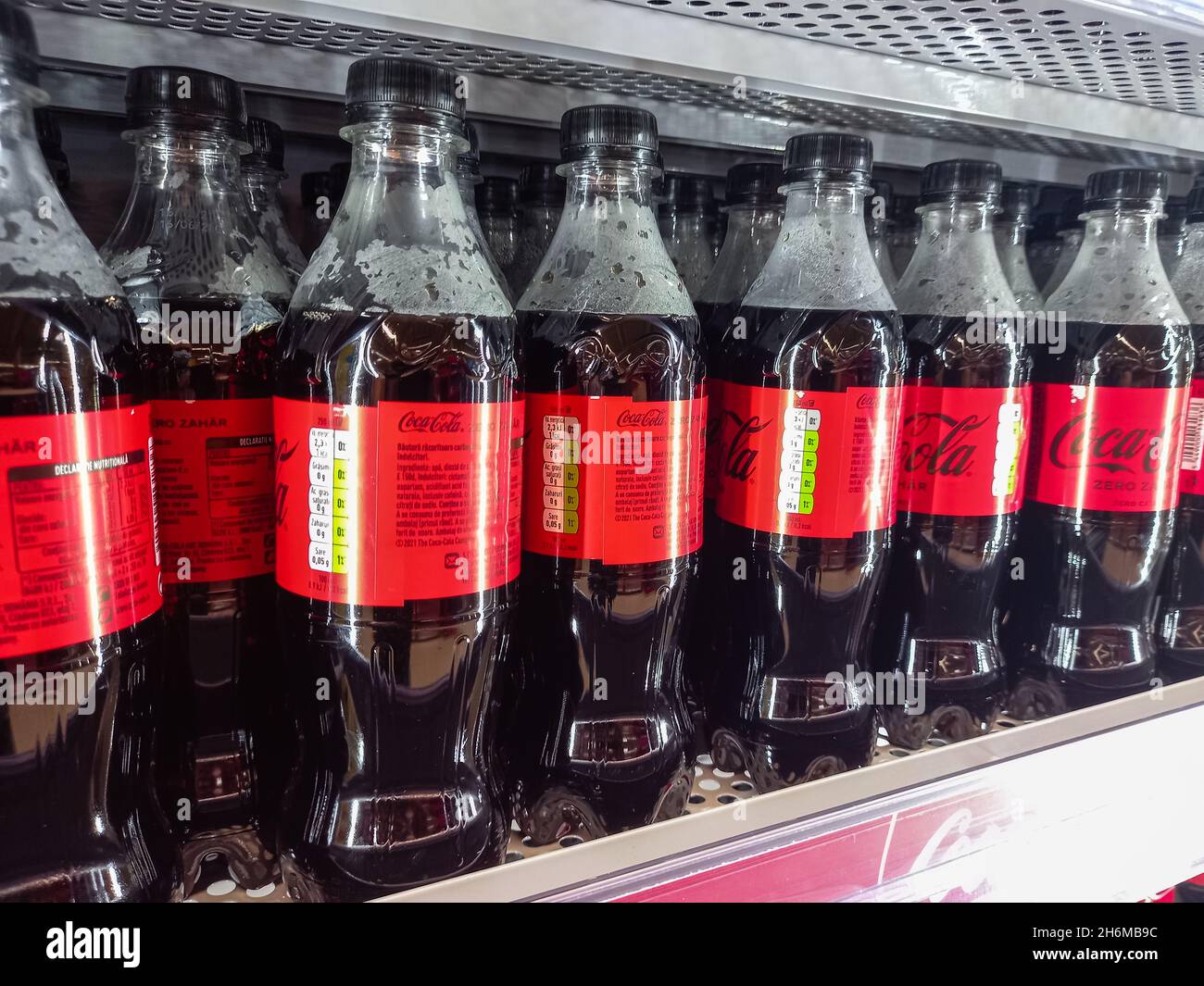 Bottle of Coca Cola. Coke soft drink of shelf in supermarket ...