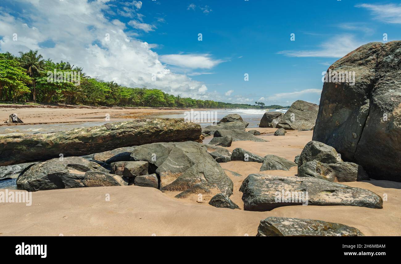 Views of the sea and the beach with boulders and where the lagoon meets ...