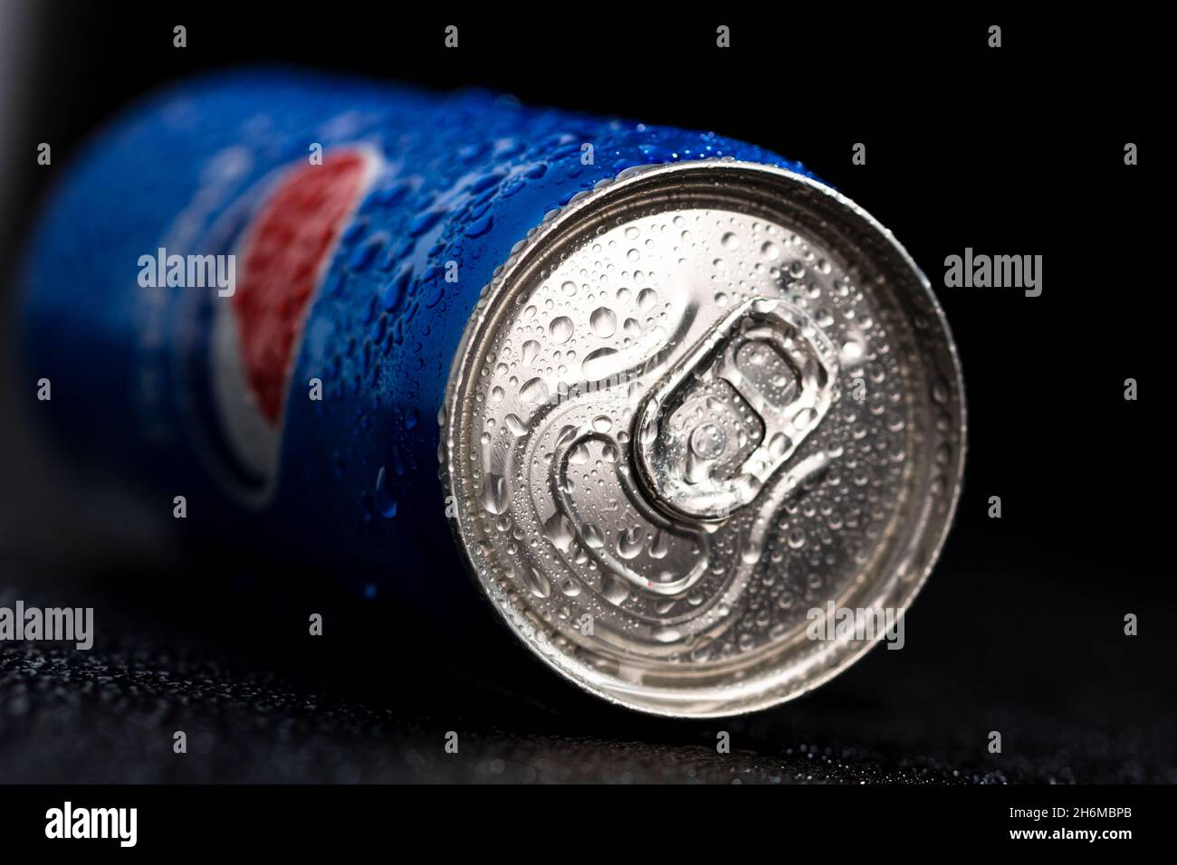 Editorial photo of Pepsi can with water droplets on black background ...