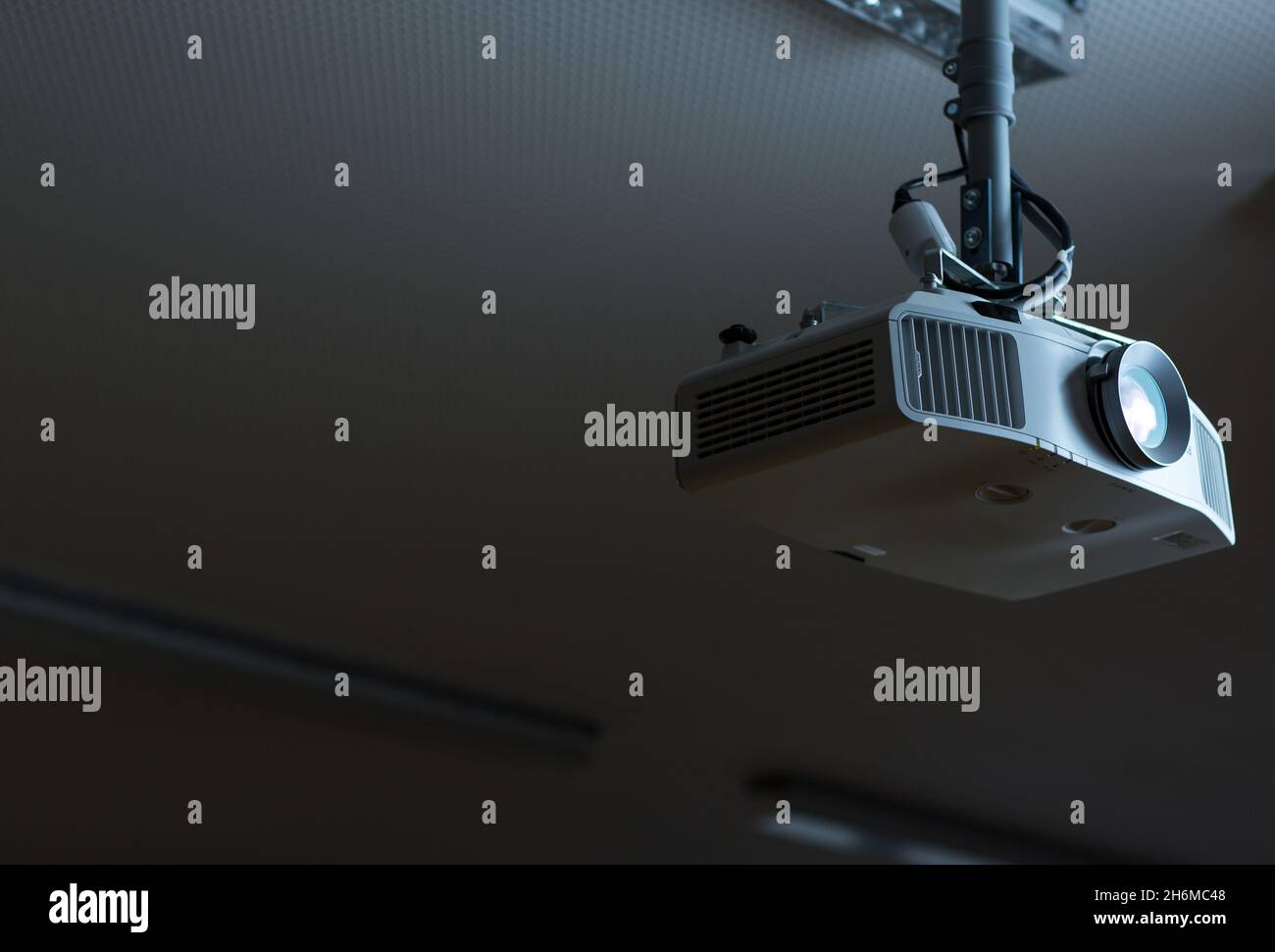 Modern laser projector in a conference room . LCD Projector technology ...