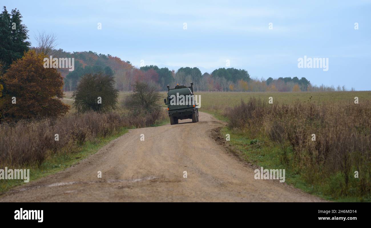 British army MAN HX3 8x8 with a JCB Forklift as cargo in action ...