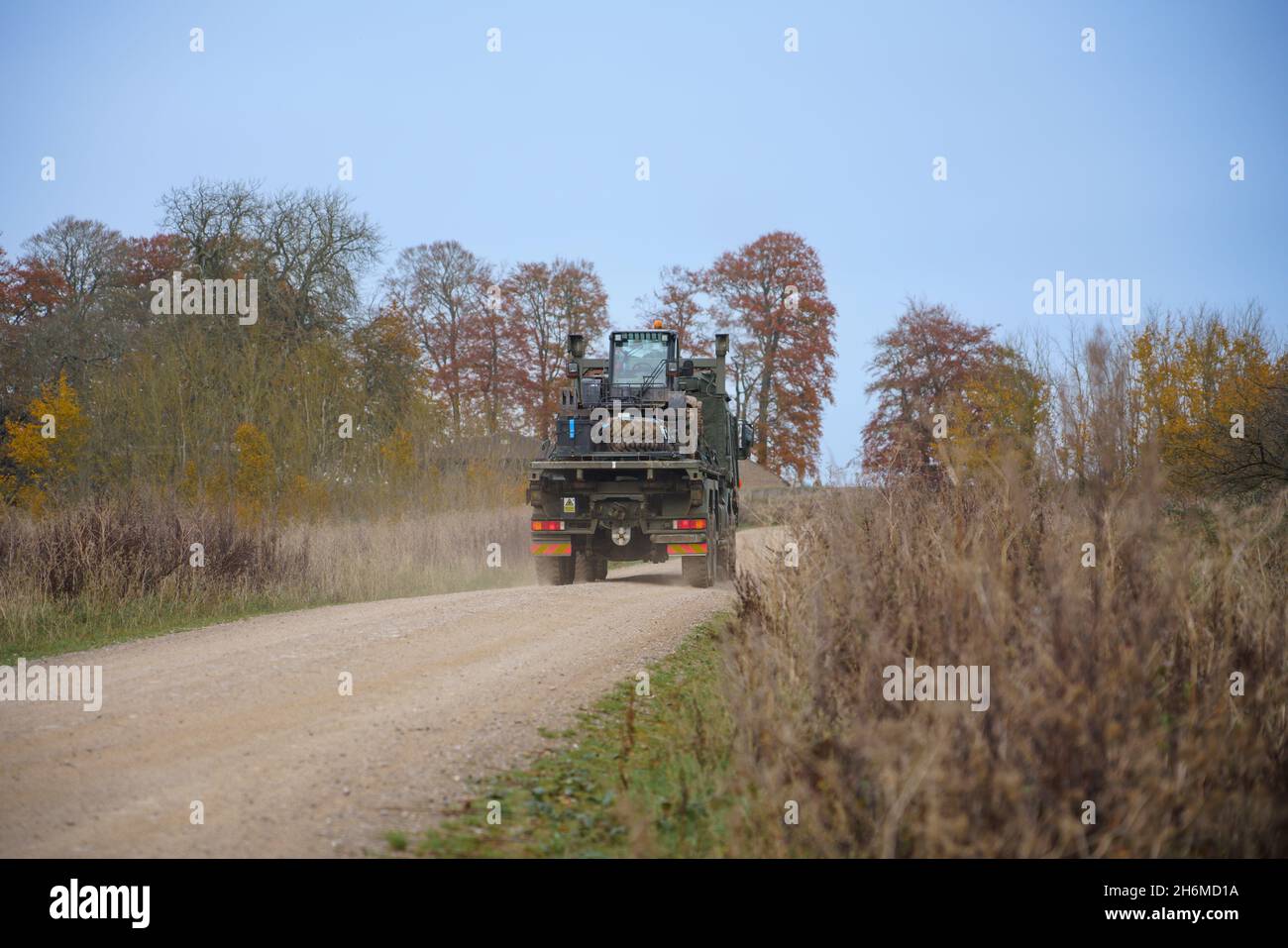 British army MAN HX77 8x8 with a JCB Forklift as cargo in action ...