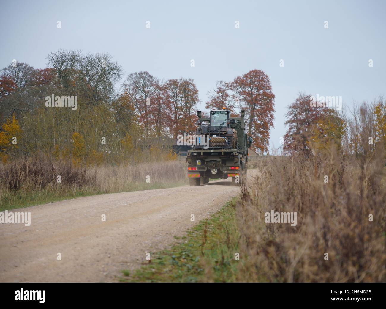British army MAN HX77 8x8 with a JCB Forklift as cargo in action ...