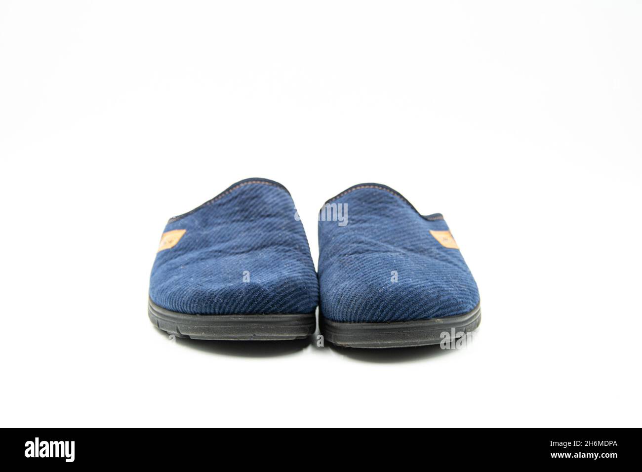 Blue slippers isolated on white background Stock Photo - Alamy