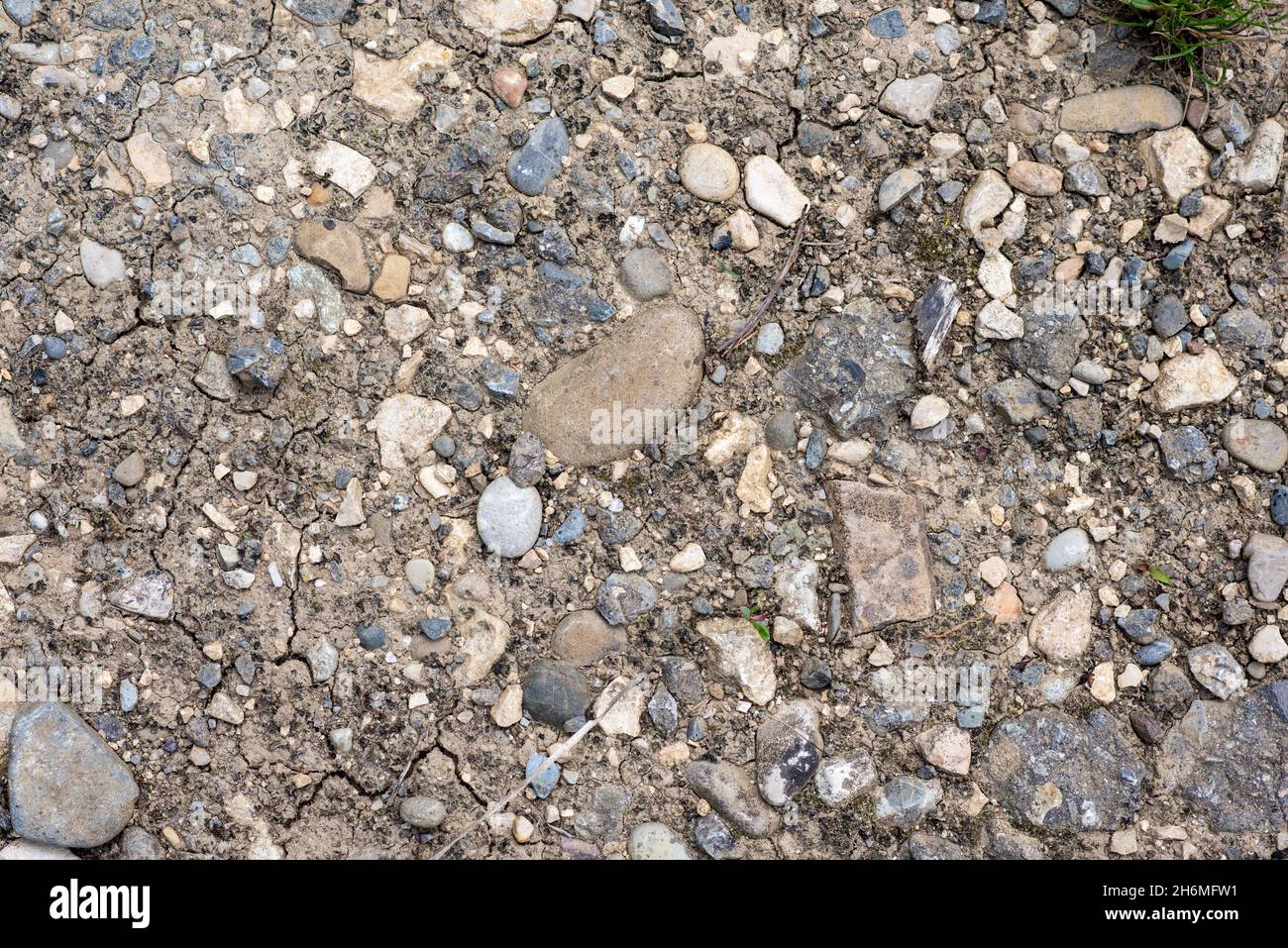 Texture. View on footpath of stones and sand Stock Photo - Alamy
