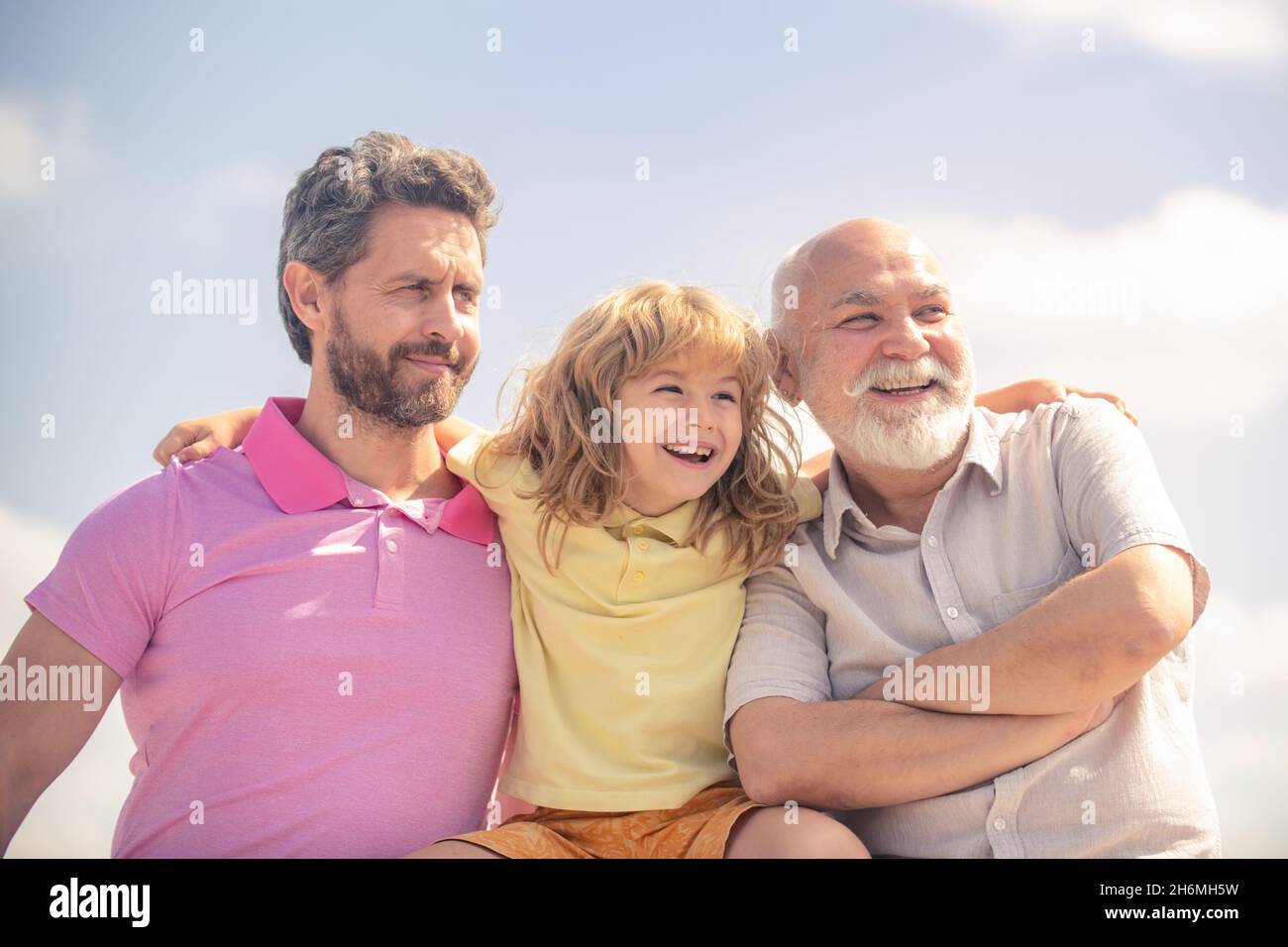 Men generation portrait of grandfather father and son child. Fathers ...