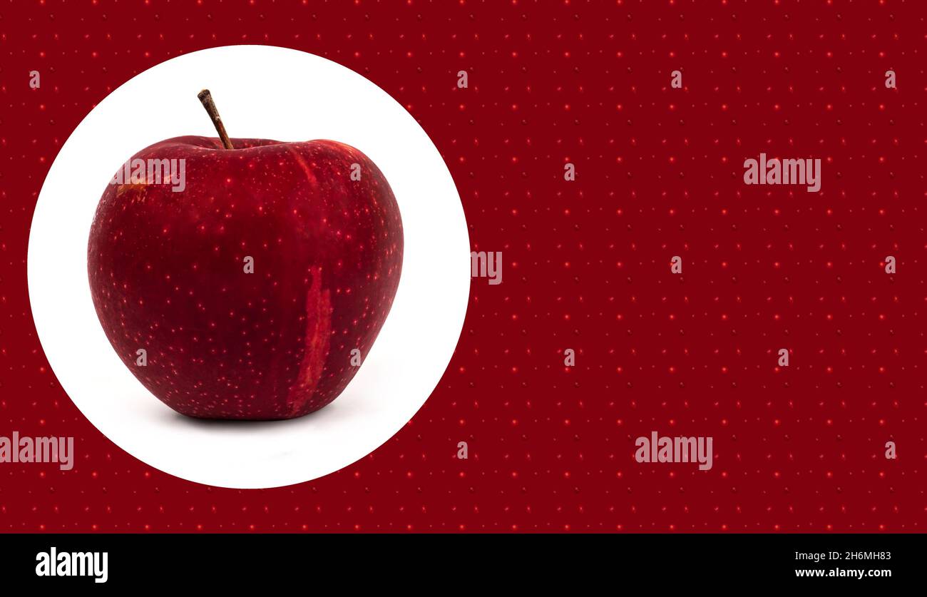 A whole ripe apple, red variety, on a white background with, a shadow ...