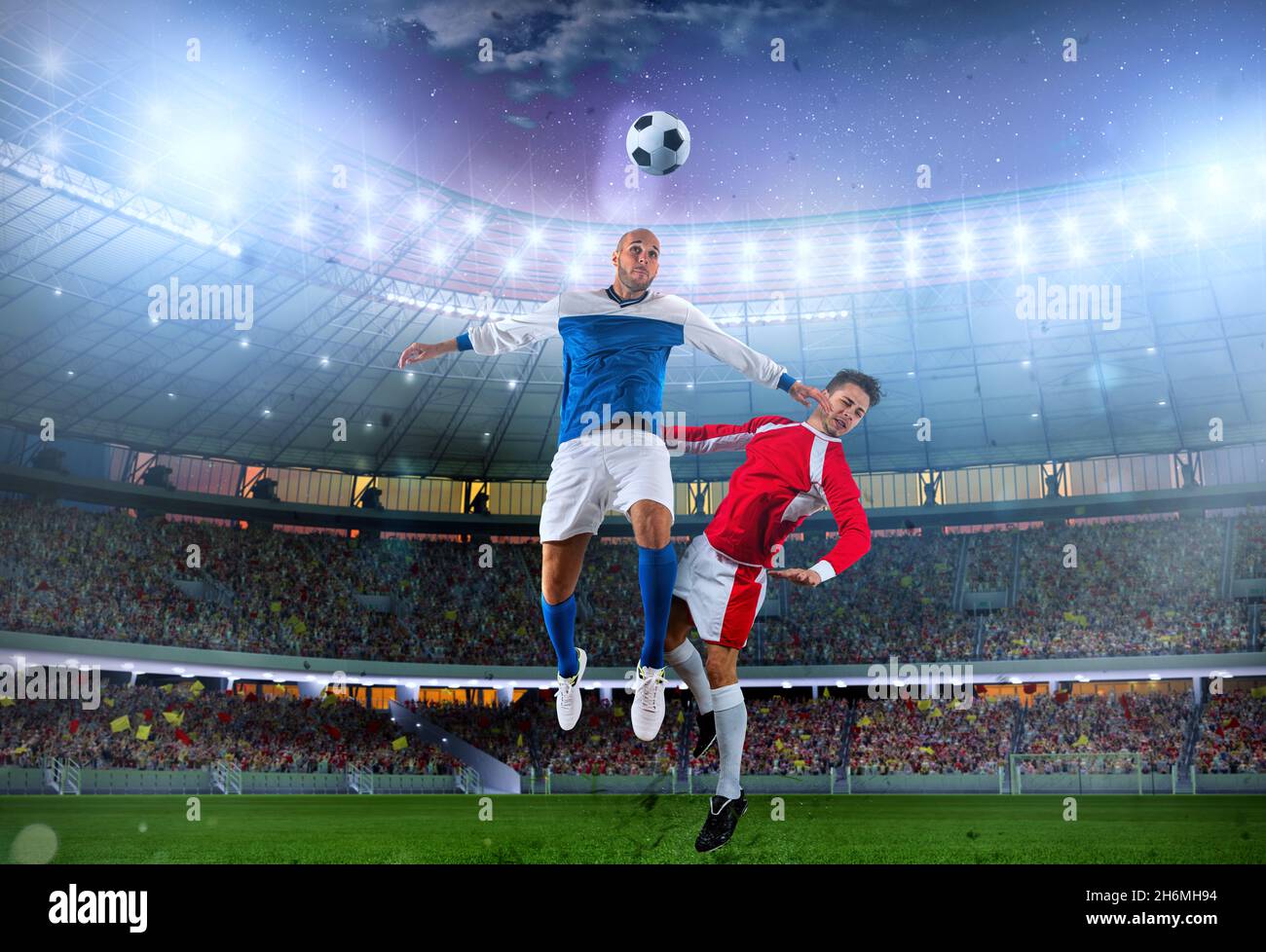 Football scene with competing football players at the stadium Stock ...