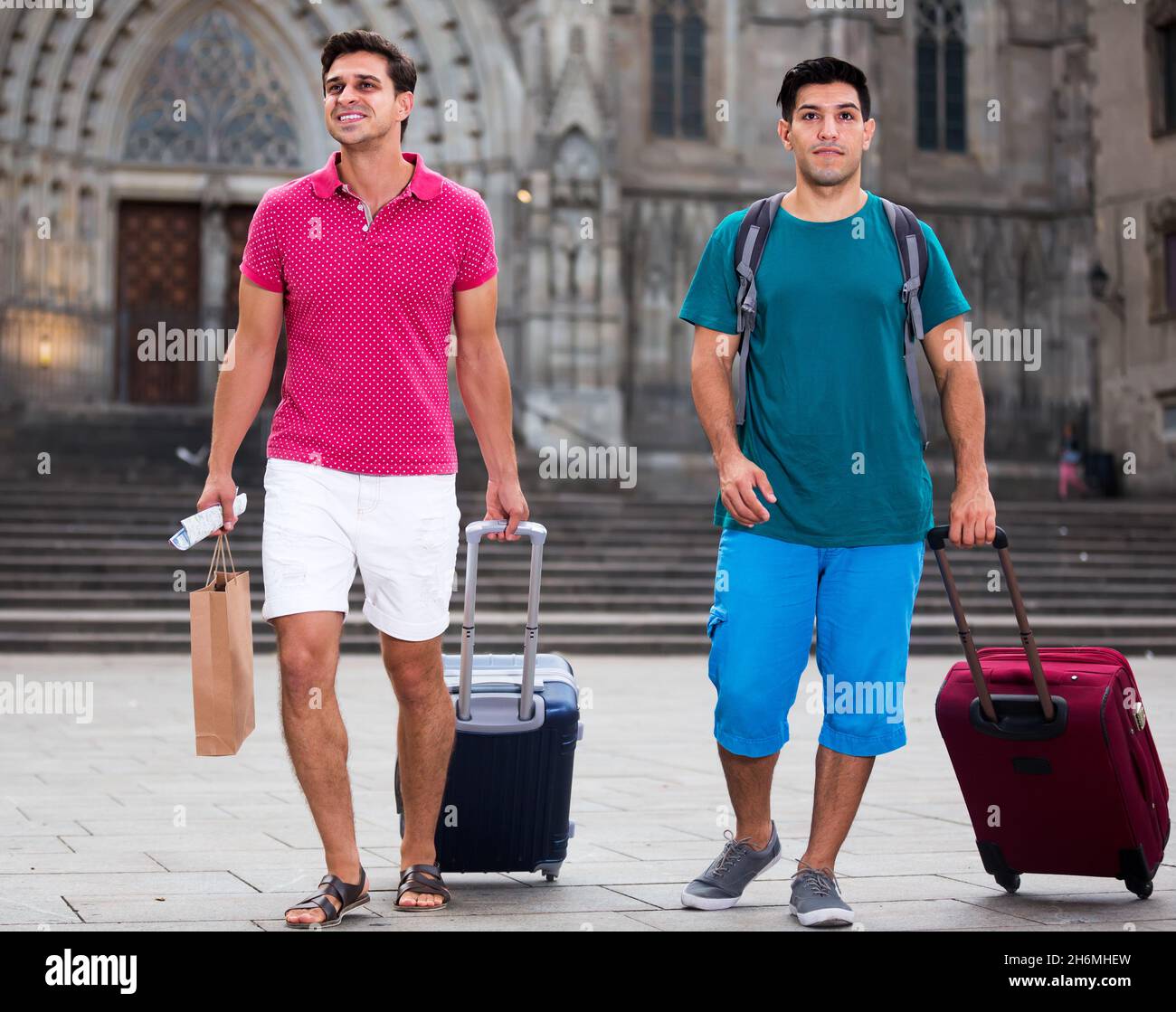 Two men walking package hi-res stock photography and images - Alamy