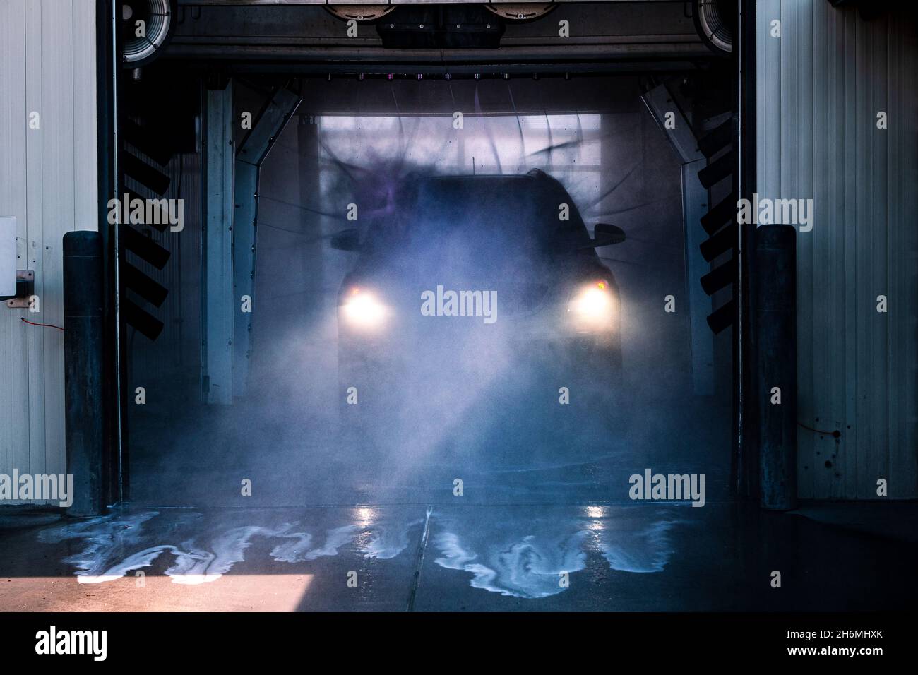 Car getting washed in a car wash in the daylight outdoors Stock Photo ...