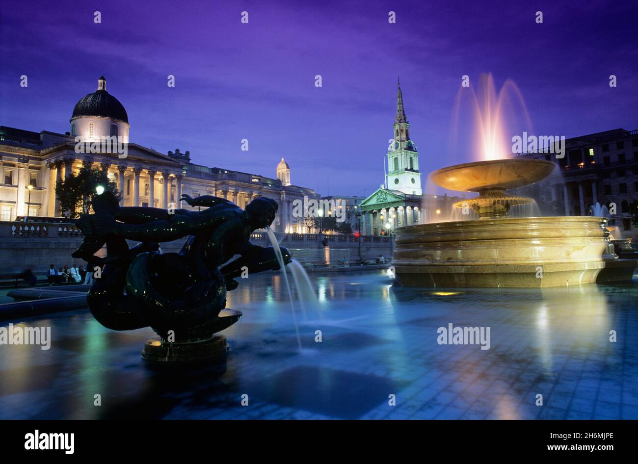 Water Fountains at Trafalgar Square at Dusk, London, England Stock ...