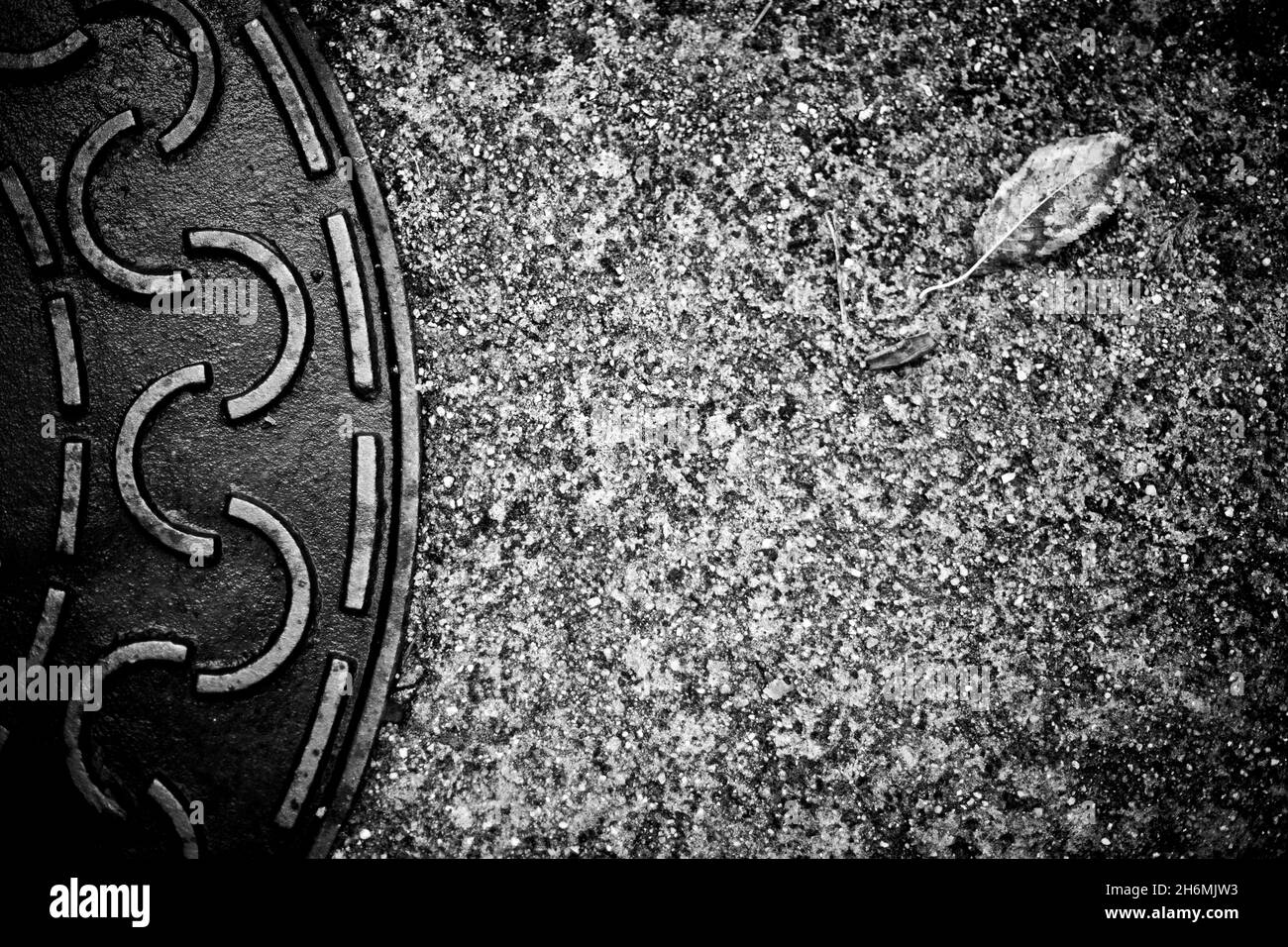 Street cover Black and White Stock Photos & Images - Alamy