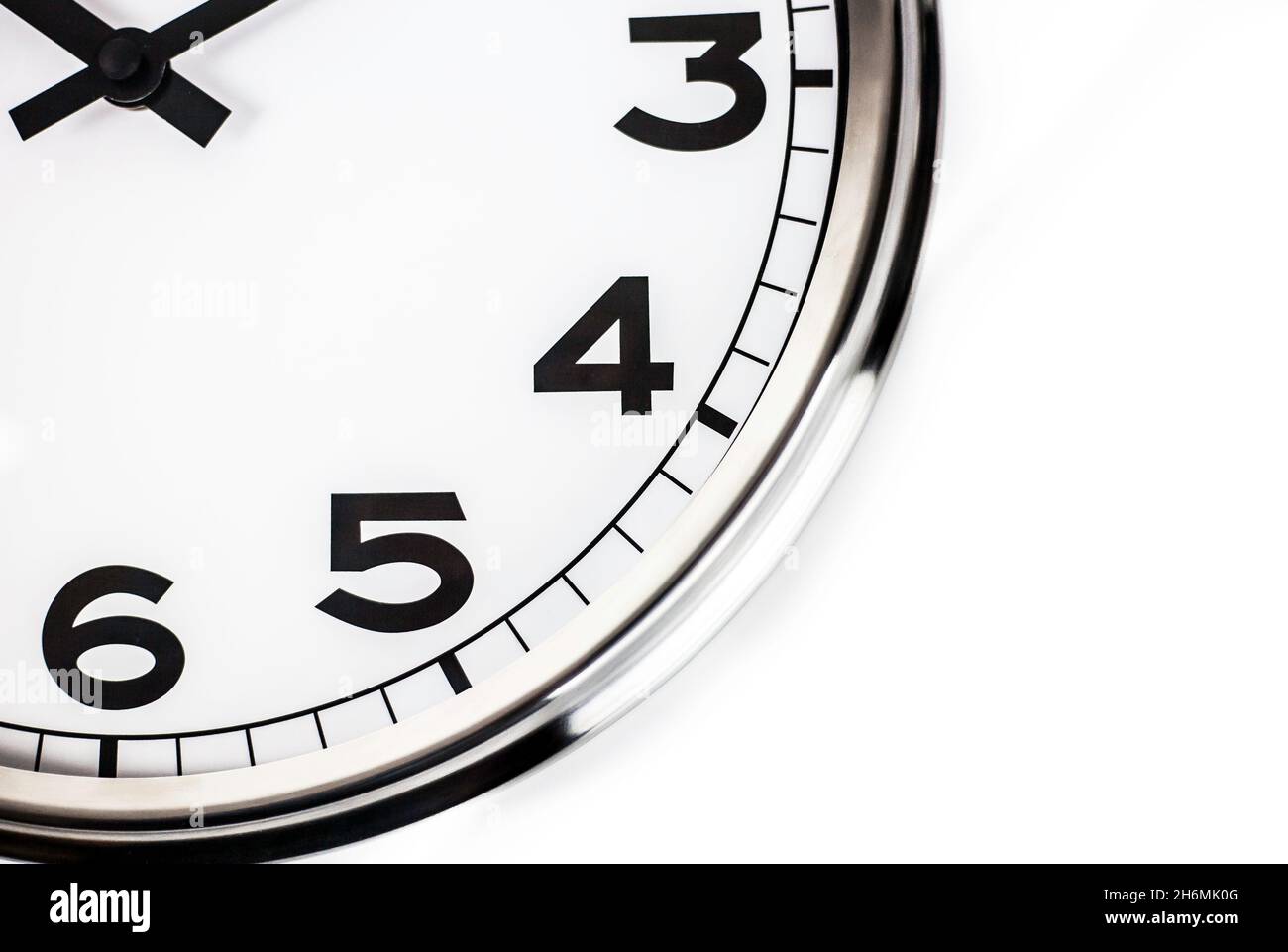 Silver clock isolated Stock Photo - Alamy