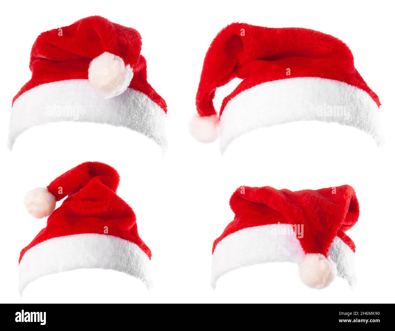 Set of 4 red Santa Claus hats isolated on white background Stock Photo ...