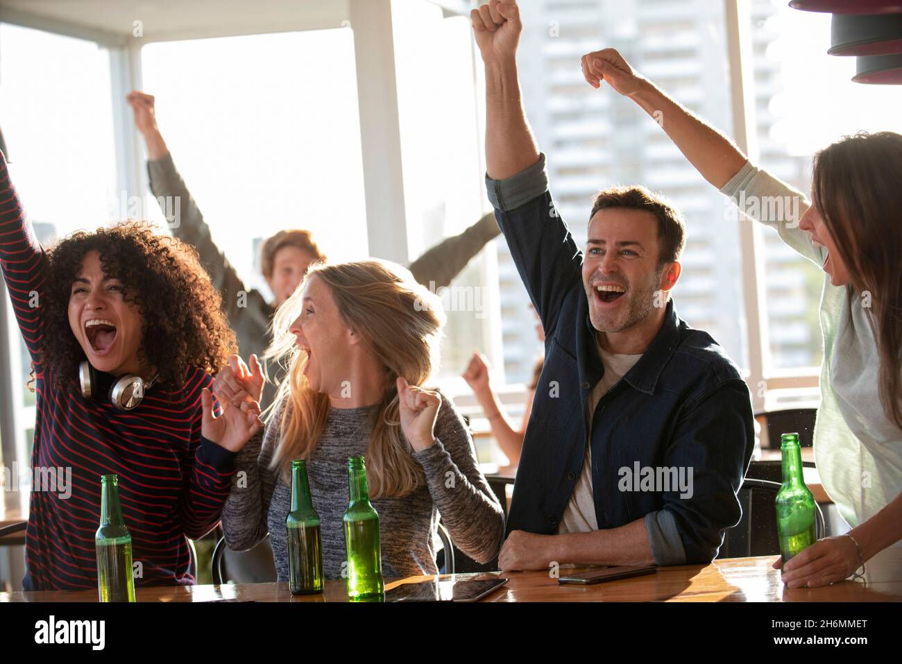 Excited business people celebrating in office Stock Photo - Alamy