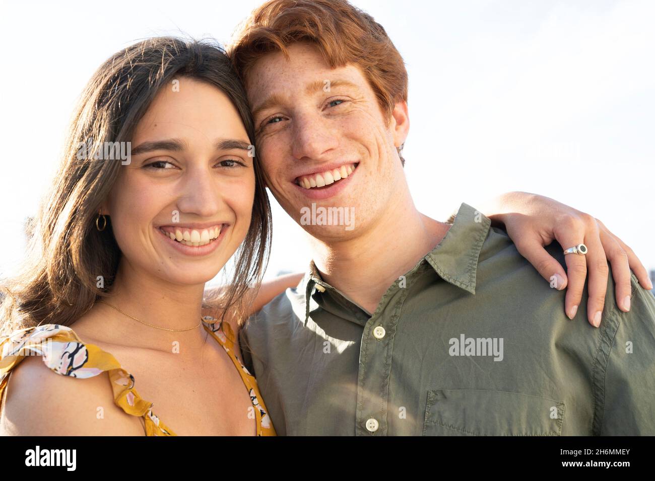 Couple with arm around each other hi-res stock photography and images ...