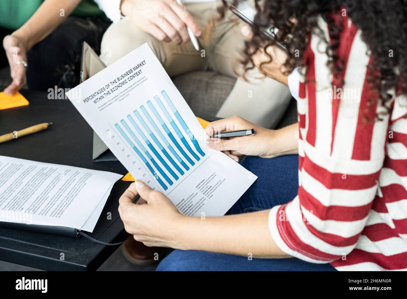 Businessman examining charts on documents hi-res stock photography and ...