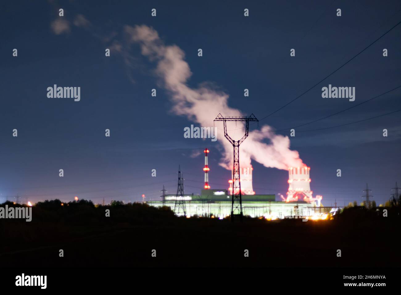 nuclear power plant at night. Air emissions Stock Photo - Alamy