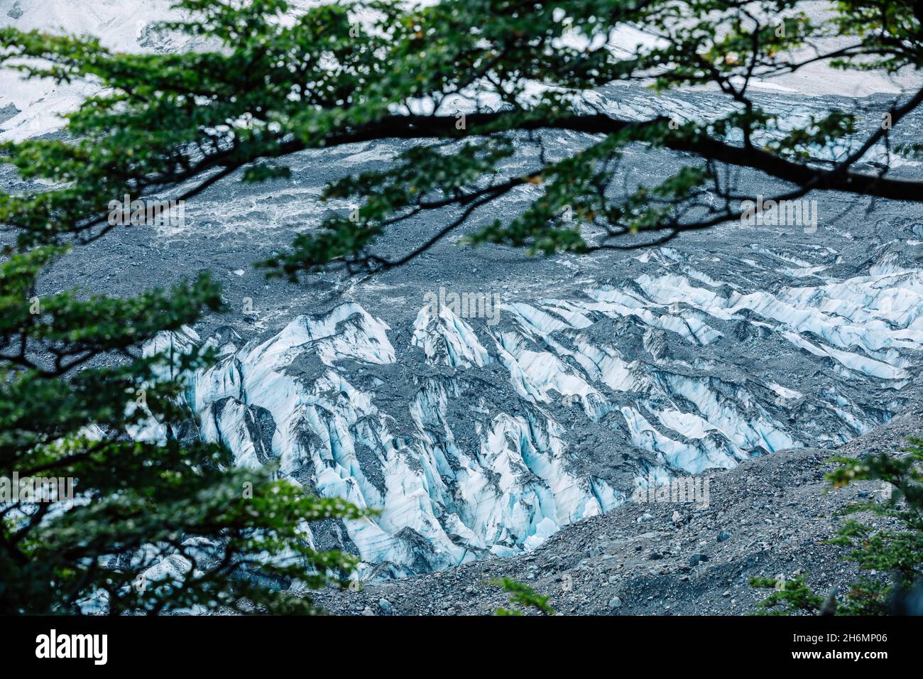 Layers of snowy ice covered with dust, Torres del Paine National Park ...