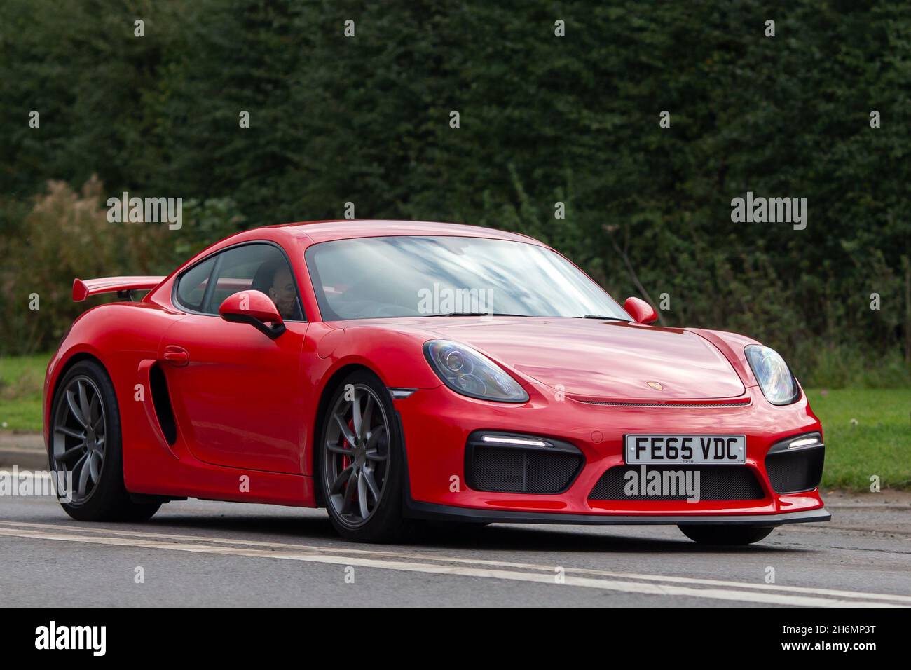 2016 red Porsche Cayman Stock Photo - Alamy