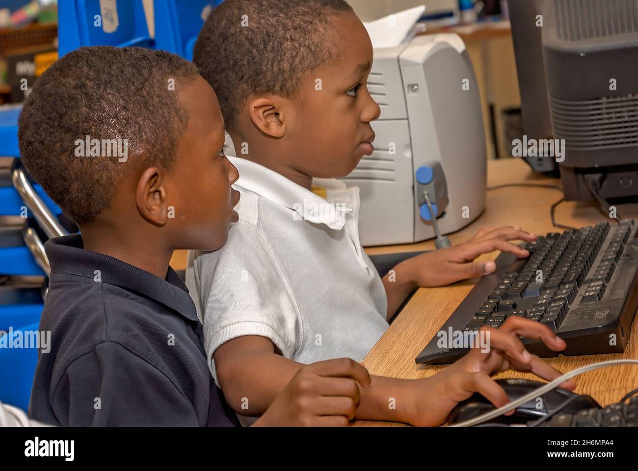 Diverse children playing in classroom hi-res stock photography and ...