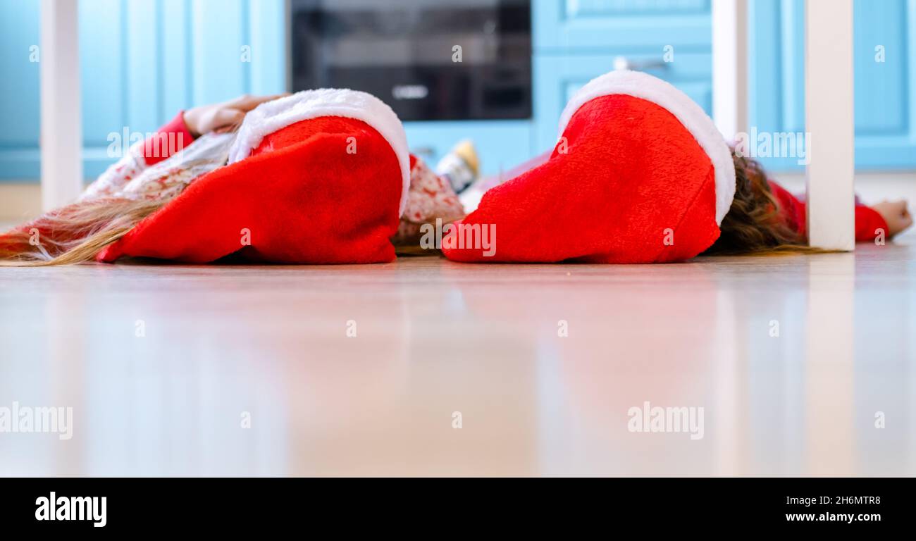 Happy children lie on floor hi-res stock photography and images - Alamy