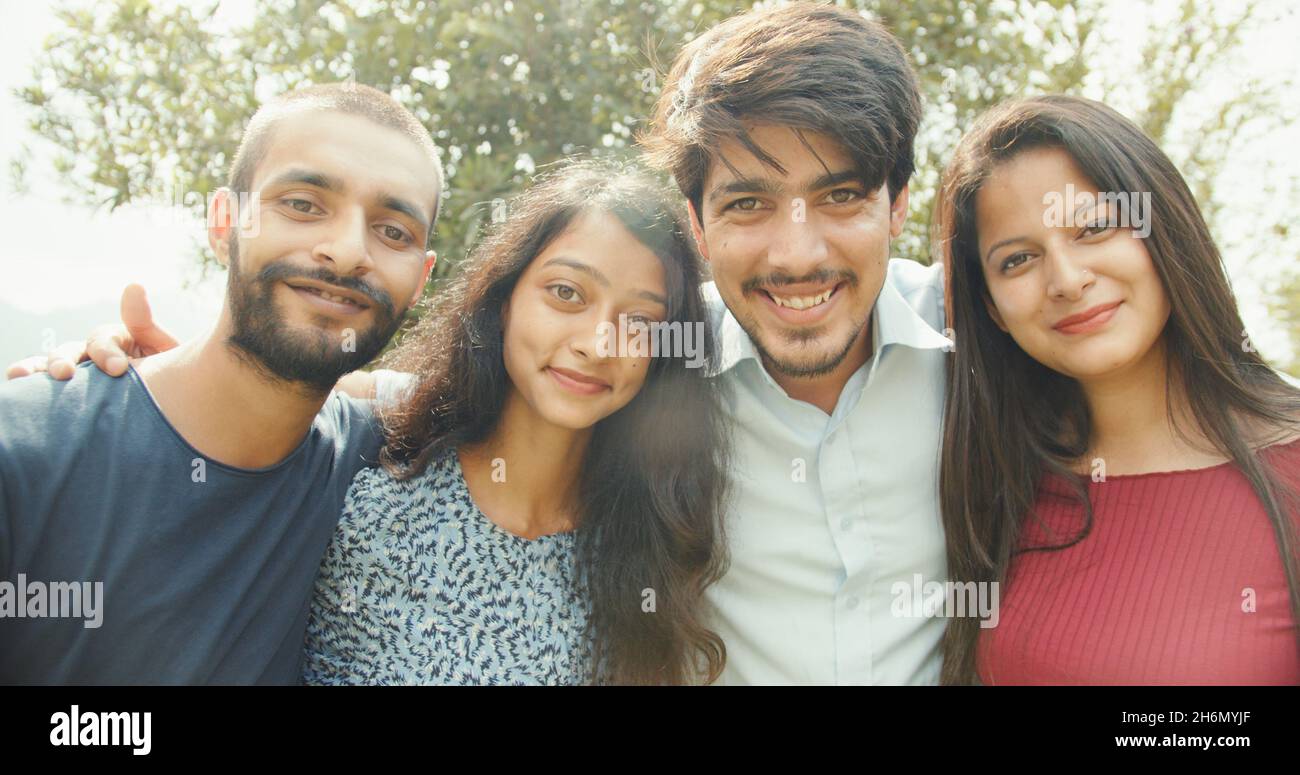 Portrait of happy young Indian friends Stock Photo - Alamy