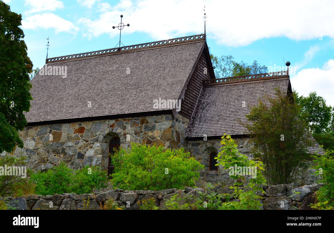 Old Scandinavian house with stone walls and tiled roof in Sweden Stock ...